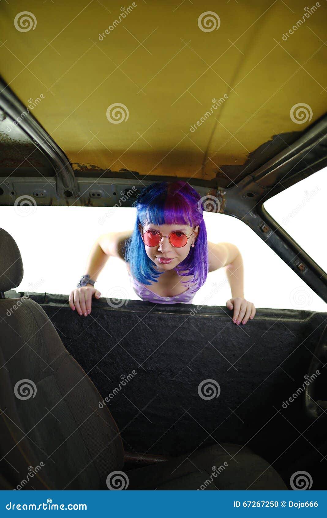 Young Hipster Woman Looking in Old Rusty Car Isolated Stock Photo ...
