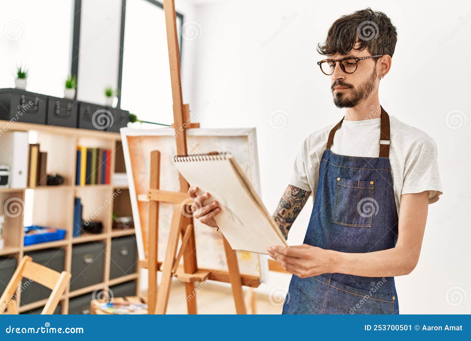 Young Hispanic Artist Man Concentrate Drawing at Art Studio Stock Image ...