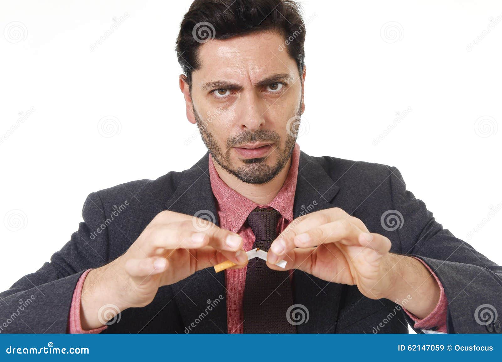 Young Hispanic Attractive Man Breaking Cigarette in Quit Smoking ...