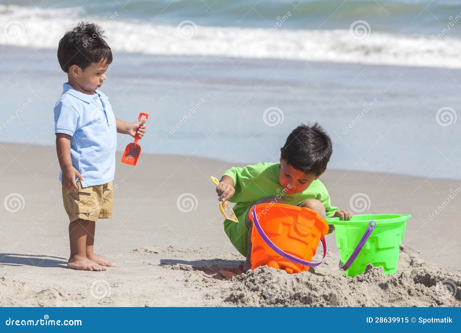 Young Hispanic Boys Children Brothers Playing Beach Stock Image - Image ...