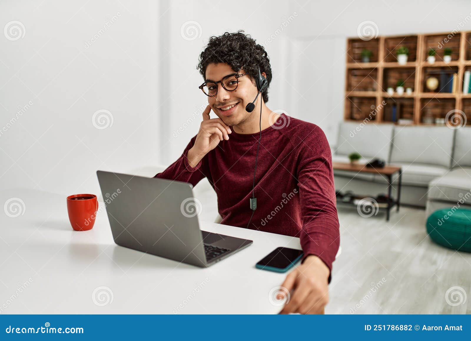 Young Hispanic Call Center Agent Man Working at Home Stock Photo ...