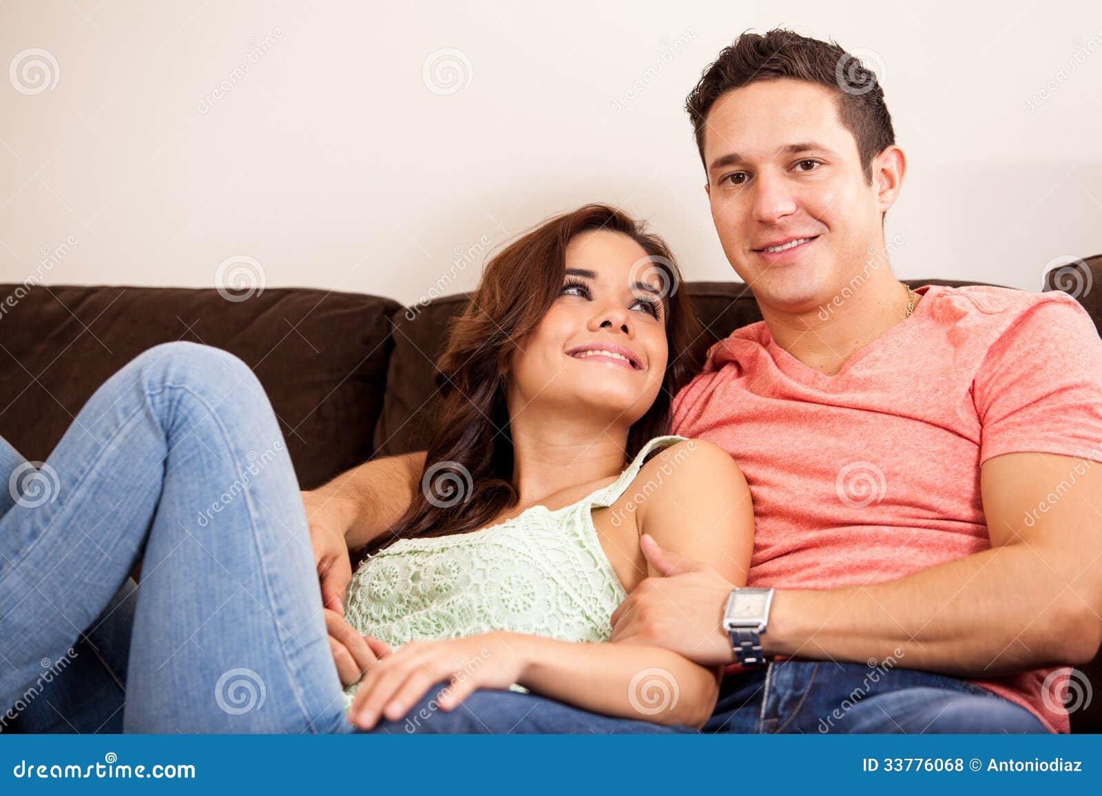 Young Hispanic Couple in Love Stock Photo - Image of date, couch: 33776068