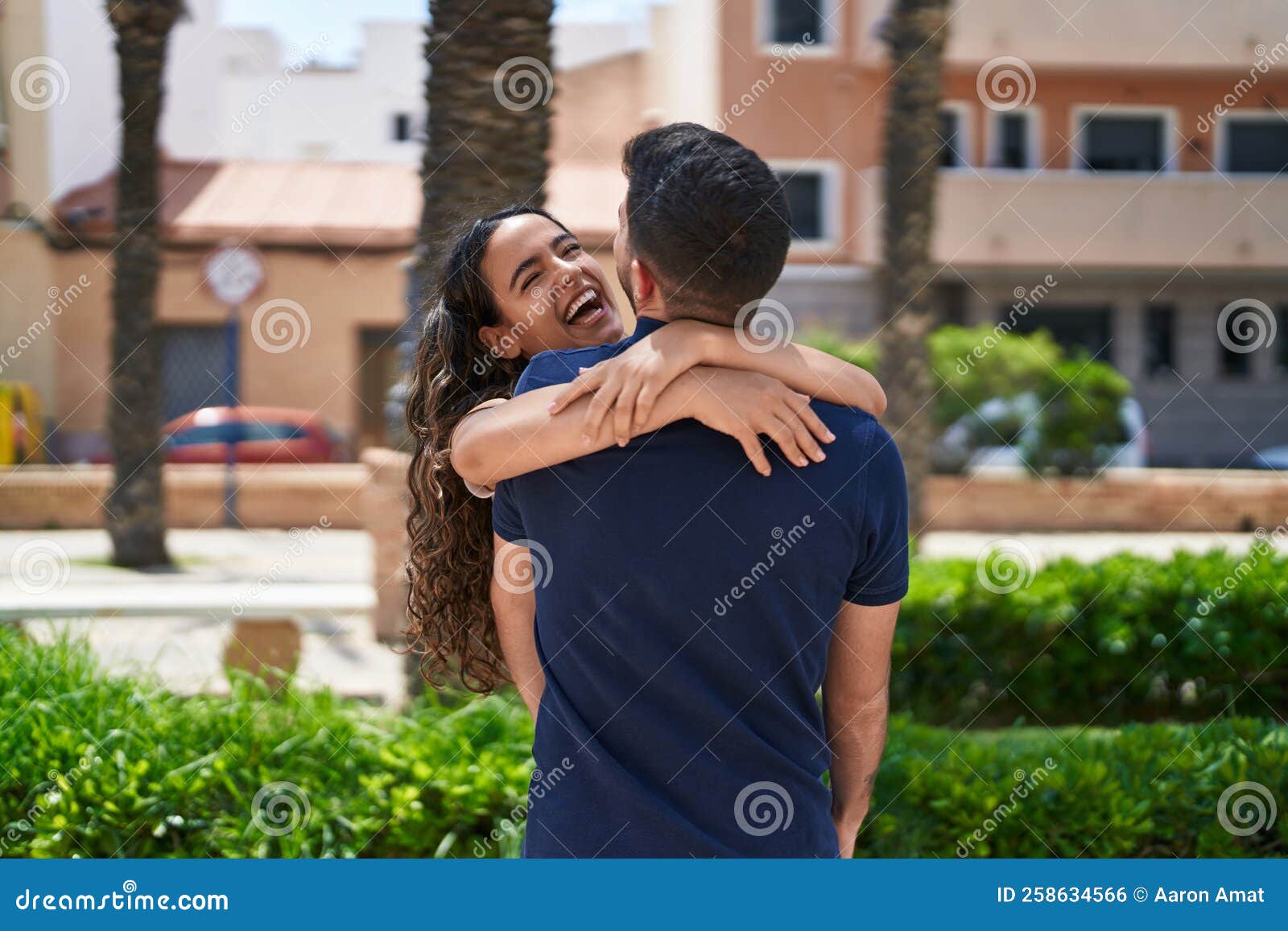 Young Hispanic Couple Smiling Confident Hugging Each Other at Park ...