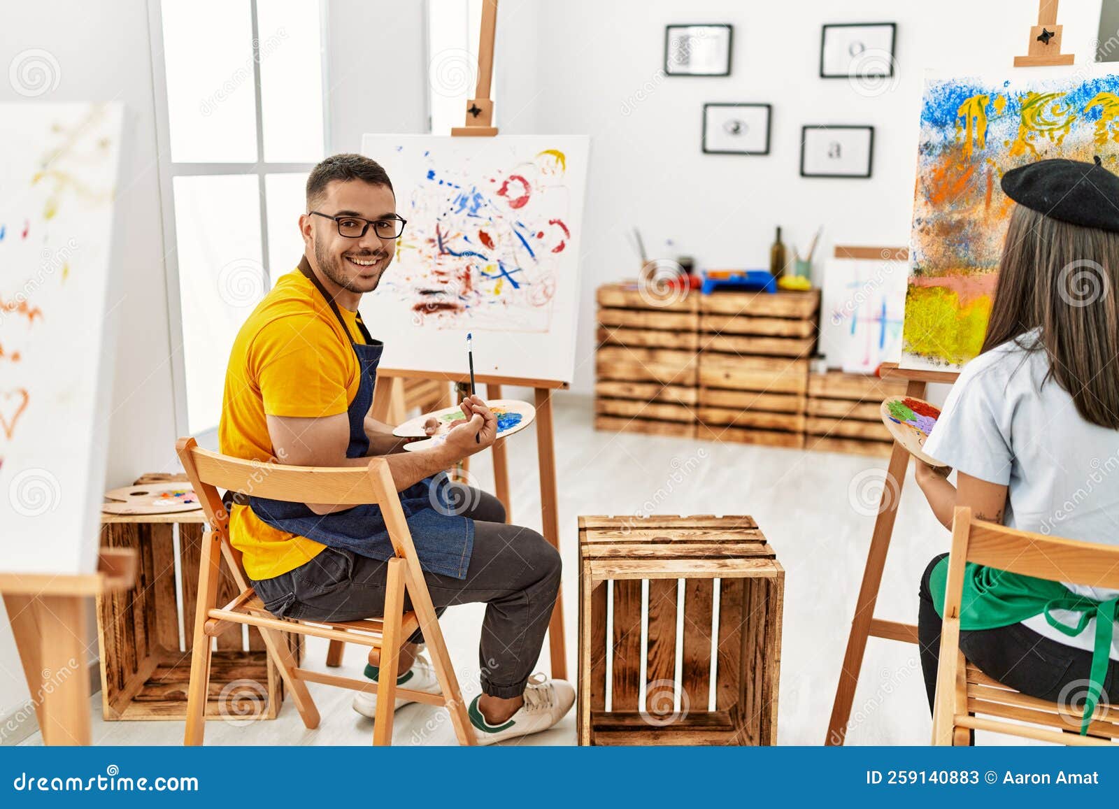 Young Hispanic Couple Smiling Happy Drawing at Art Studio Stock Image ...