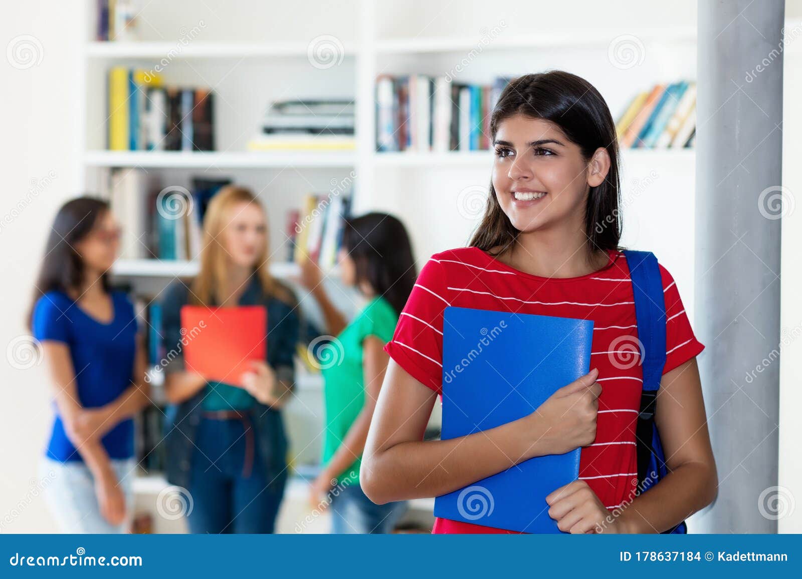Young Hispanic Female Student with Group of Multi Ethnic College ...