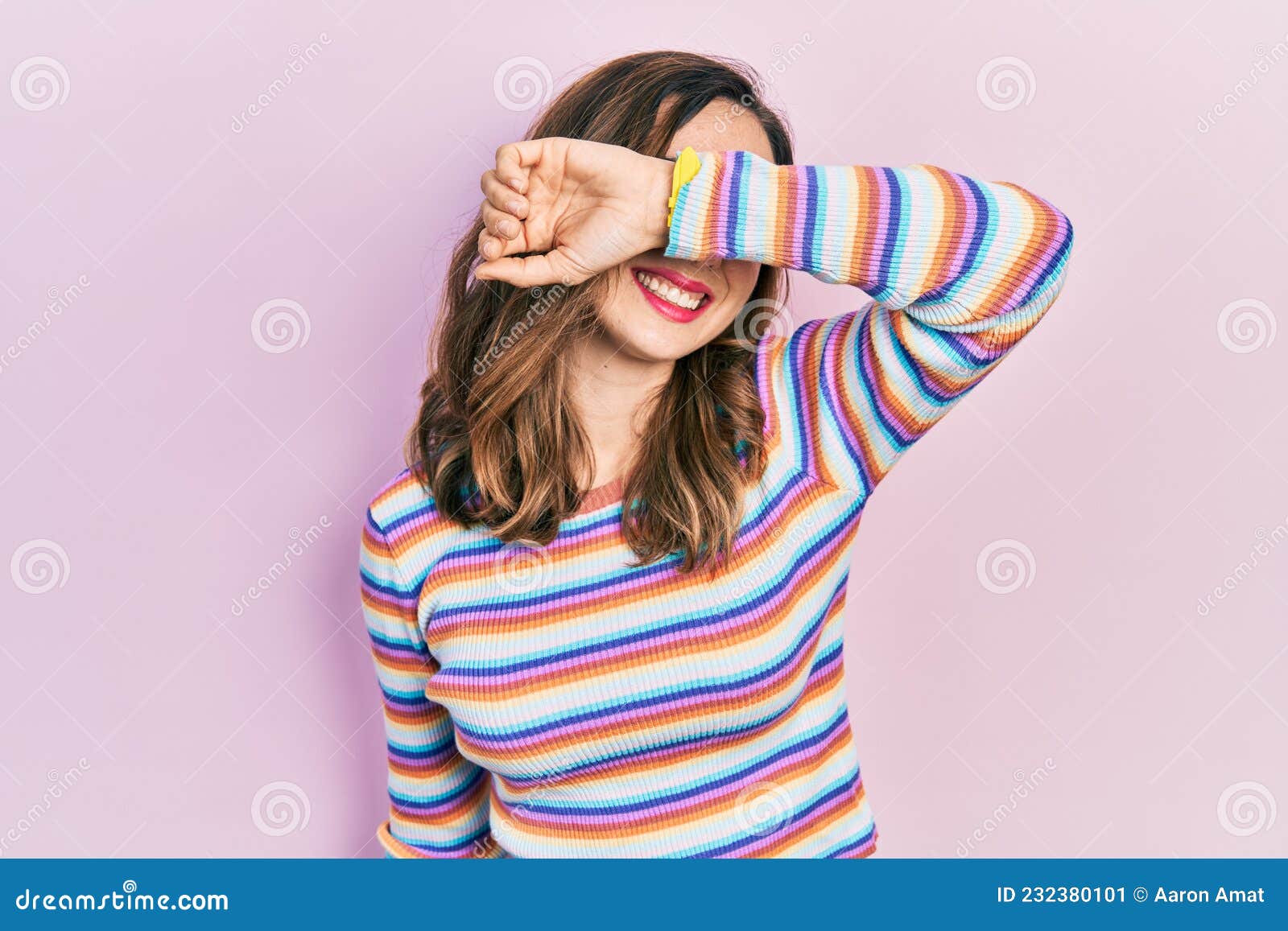 Young Hispanic Girl Wearing Casual Clothes Covering Eyes With Arm