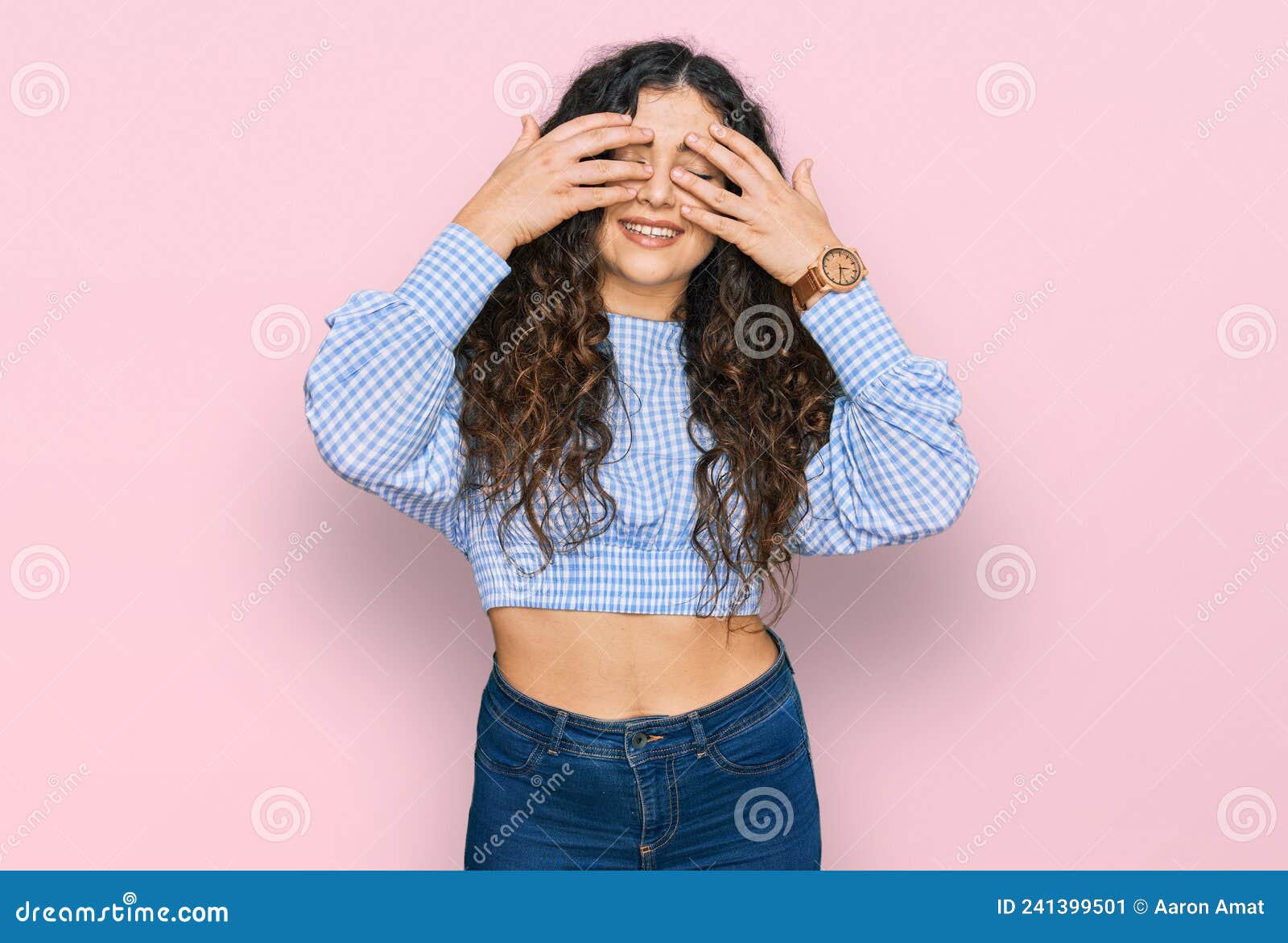 Young Hispanic Girl Wearing Casual Clothes Covering Eyes With Hands