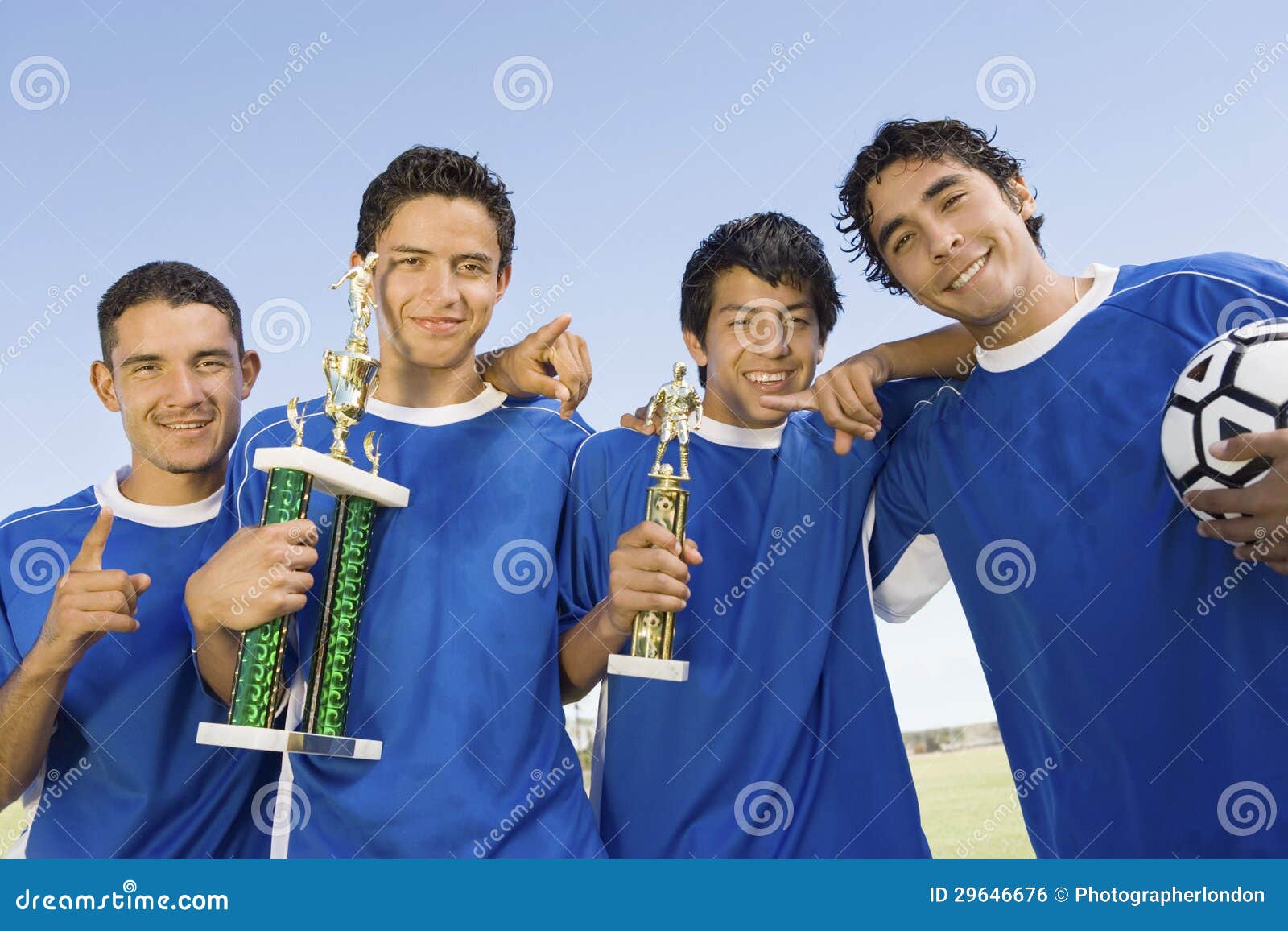 Young Hispanic Latin Football Team with Trophy Stock Photo - Image of ...
