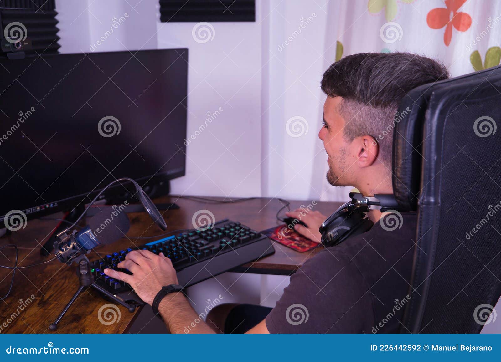 Young Hispanic Male Sitting in Front of Computer Ready To Work Stock ...