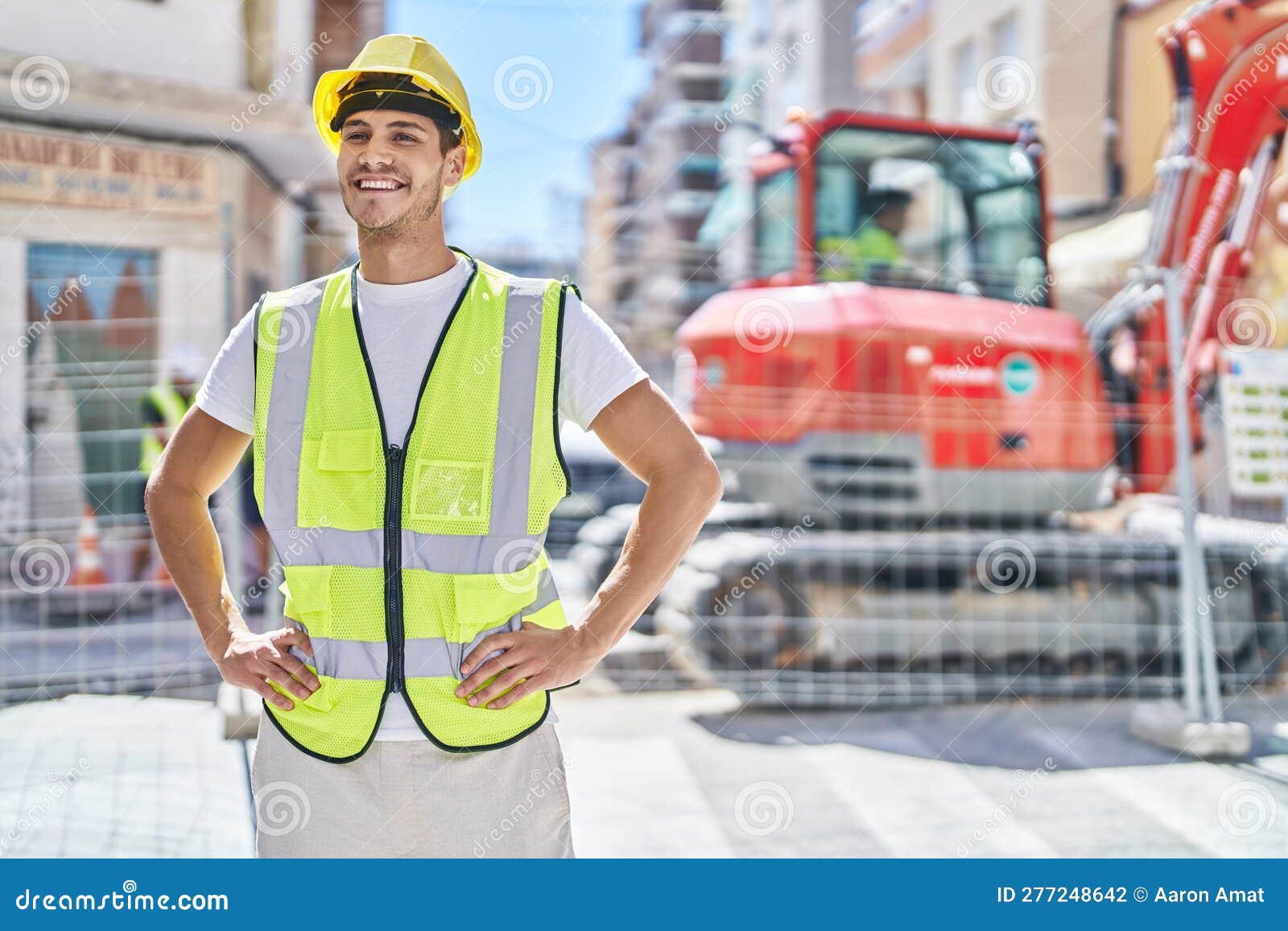 Young Hispanic Man Architect Smiling Confident Standing at Park Stock ... Young Hispanic Man Architect Smiling Confident Standing at Park Stock ...