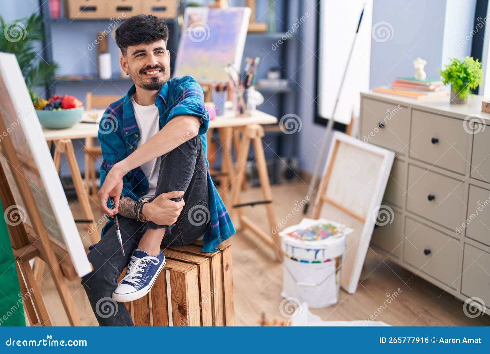 Young Hispanic Man Artist Smiling Confident Drawing at Art Studio Stock ...