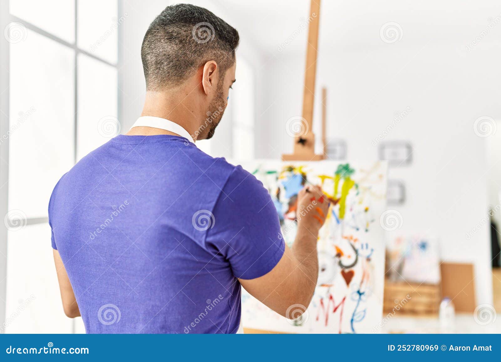 Young Hispanic Man on Back View Drawing at Art Studio Stock Image ...