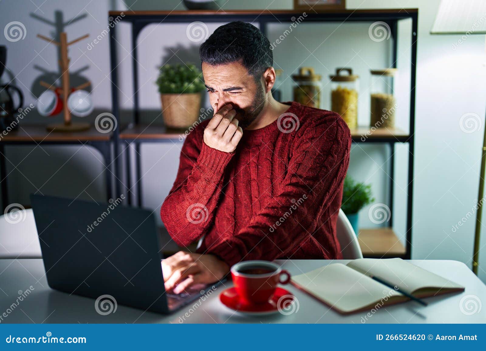 Young Hispanic Man with Beard Using Computer Laptop at Night at Home ...