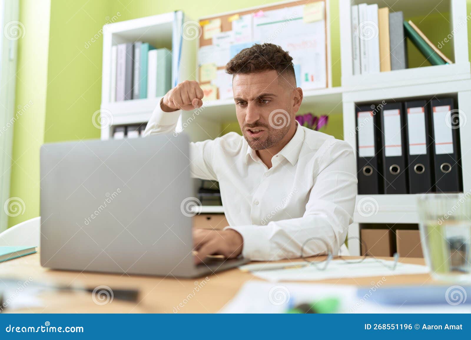 Young Hispanic Man Business Worker Angry Screaming at Office Stock ...