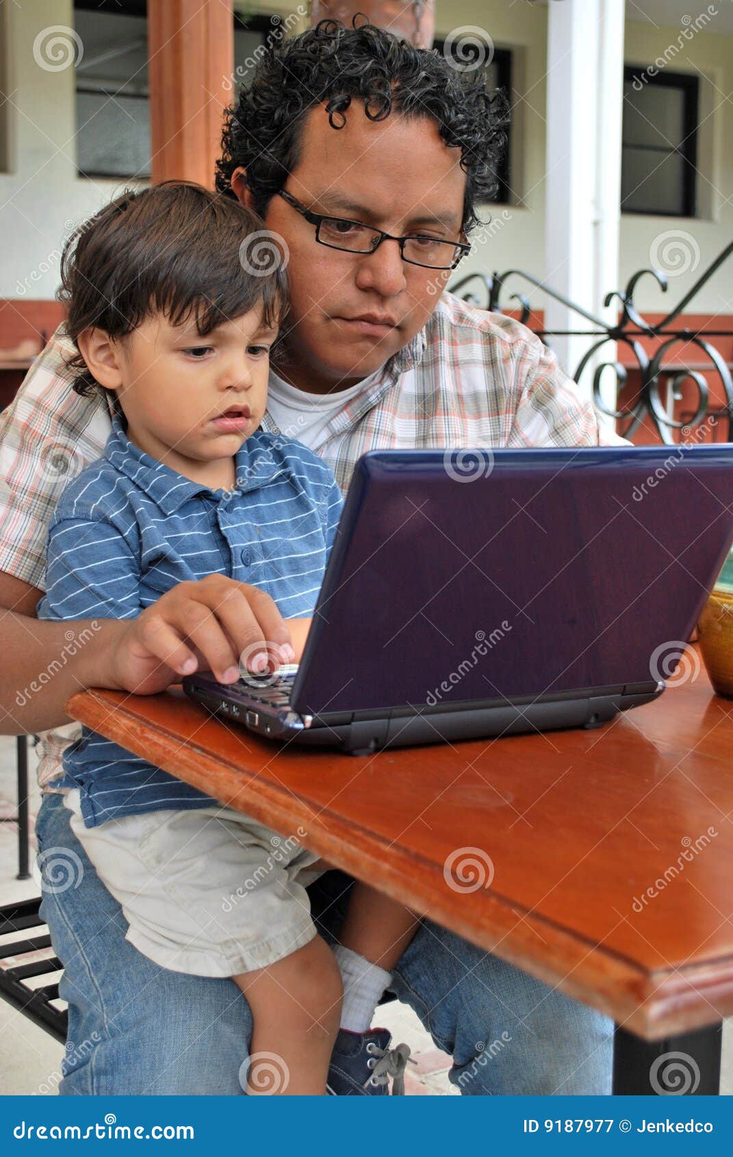 Young Hispanic Man on a Computer Stock Image - Image of group, nature ...