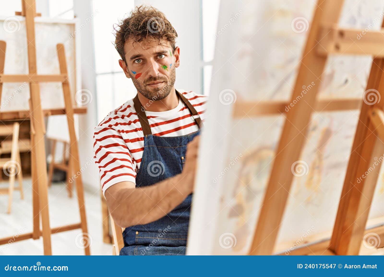 Young Hispanic Man Drawing at Art Studio Stock Image - Image of brush ...