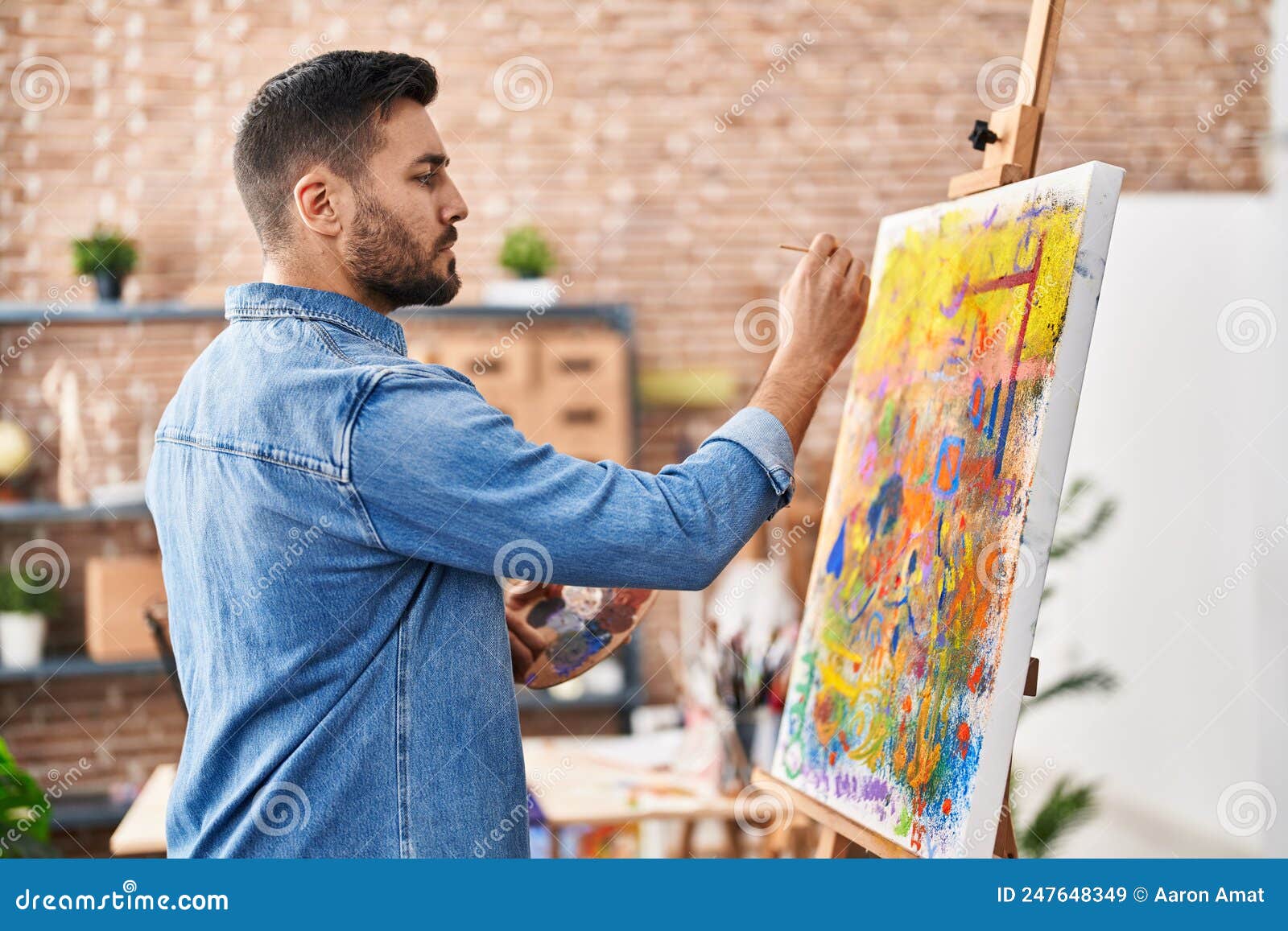 Young Hispanic Man Drawing at Art Studio Stock Image - Image of draw ...