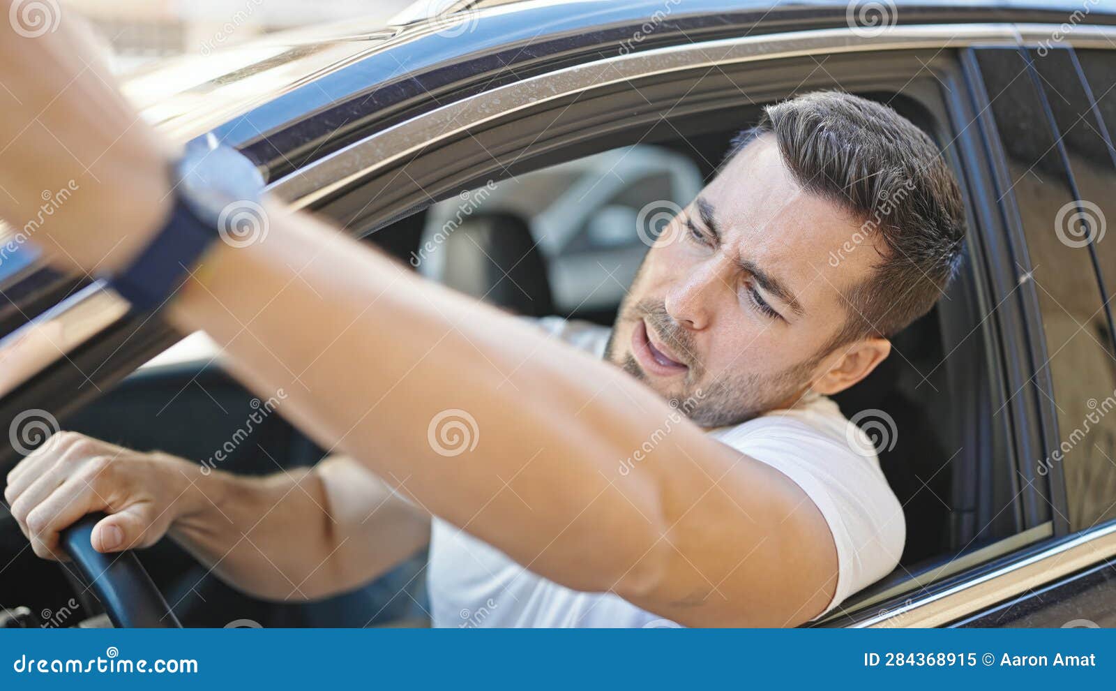 Young Hispanic Man Driving Car at Street Stock Image - Image of belt ...