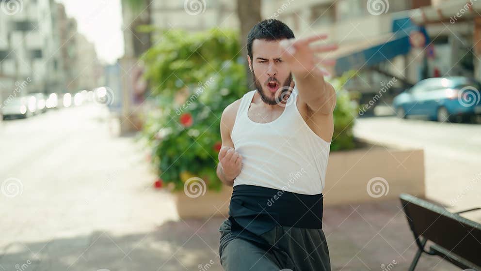 Young Hispanic Man Karate Fighter Training at Park Stock Image - Image ...