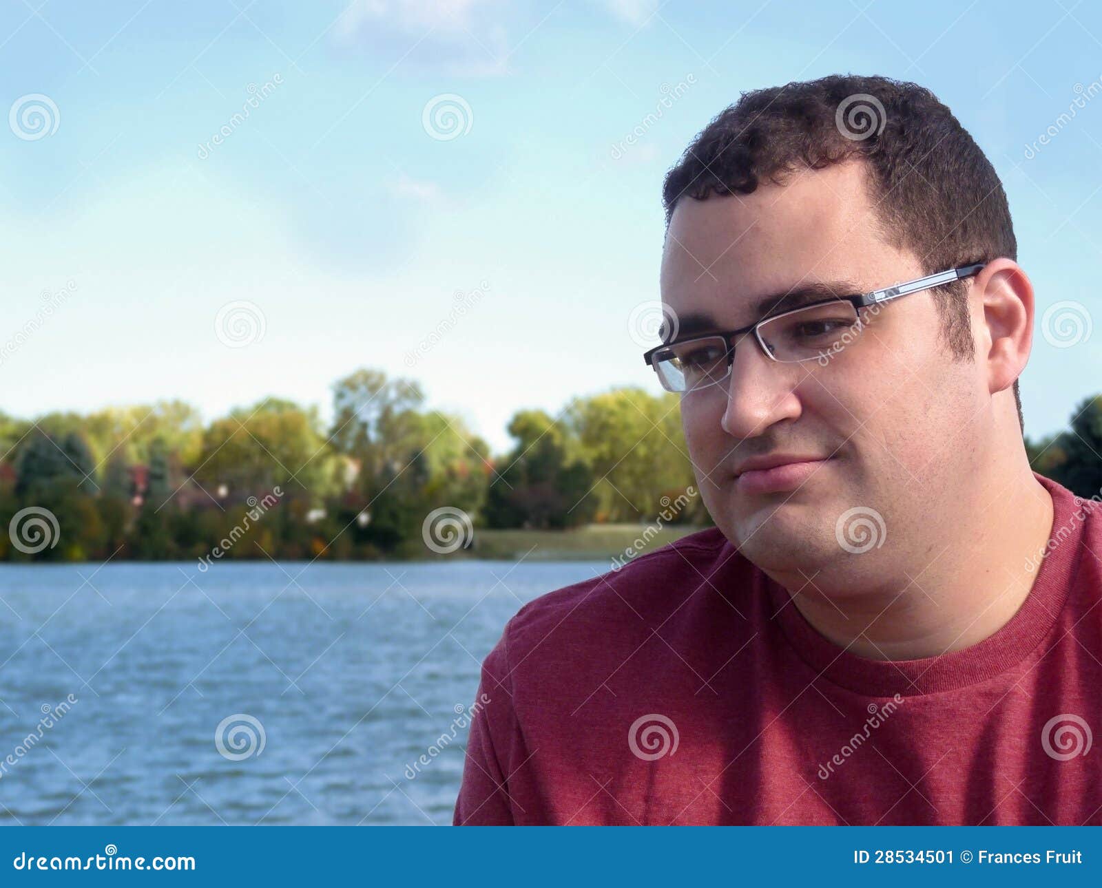 Young Hispanic man by lake stock image. Image of person - 28534501