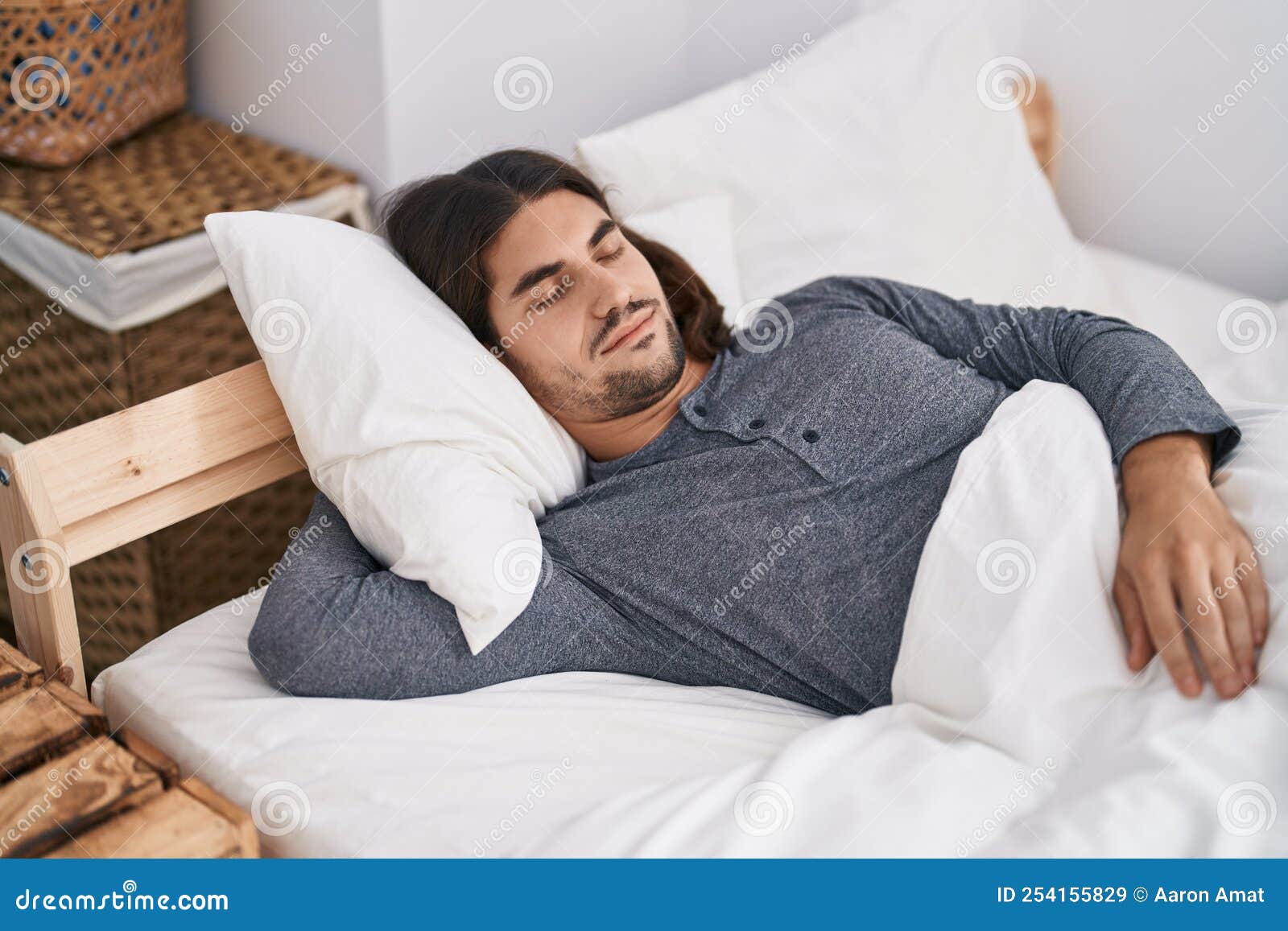 Young Hispanic Man Lying on Bed Sleeping at Bedroom Stock Image - Image ...