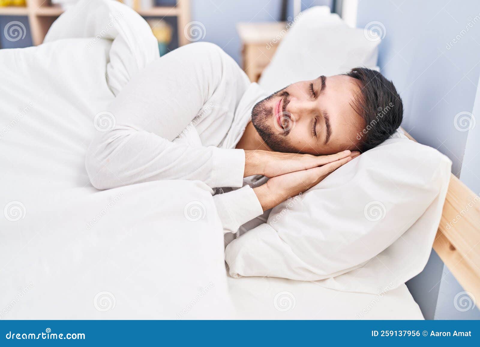 Young Hispanic Man Lying on Bed Sleeping at Bedroom Stock Photo - Image ...