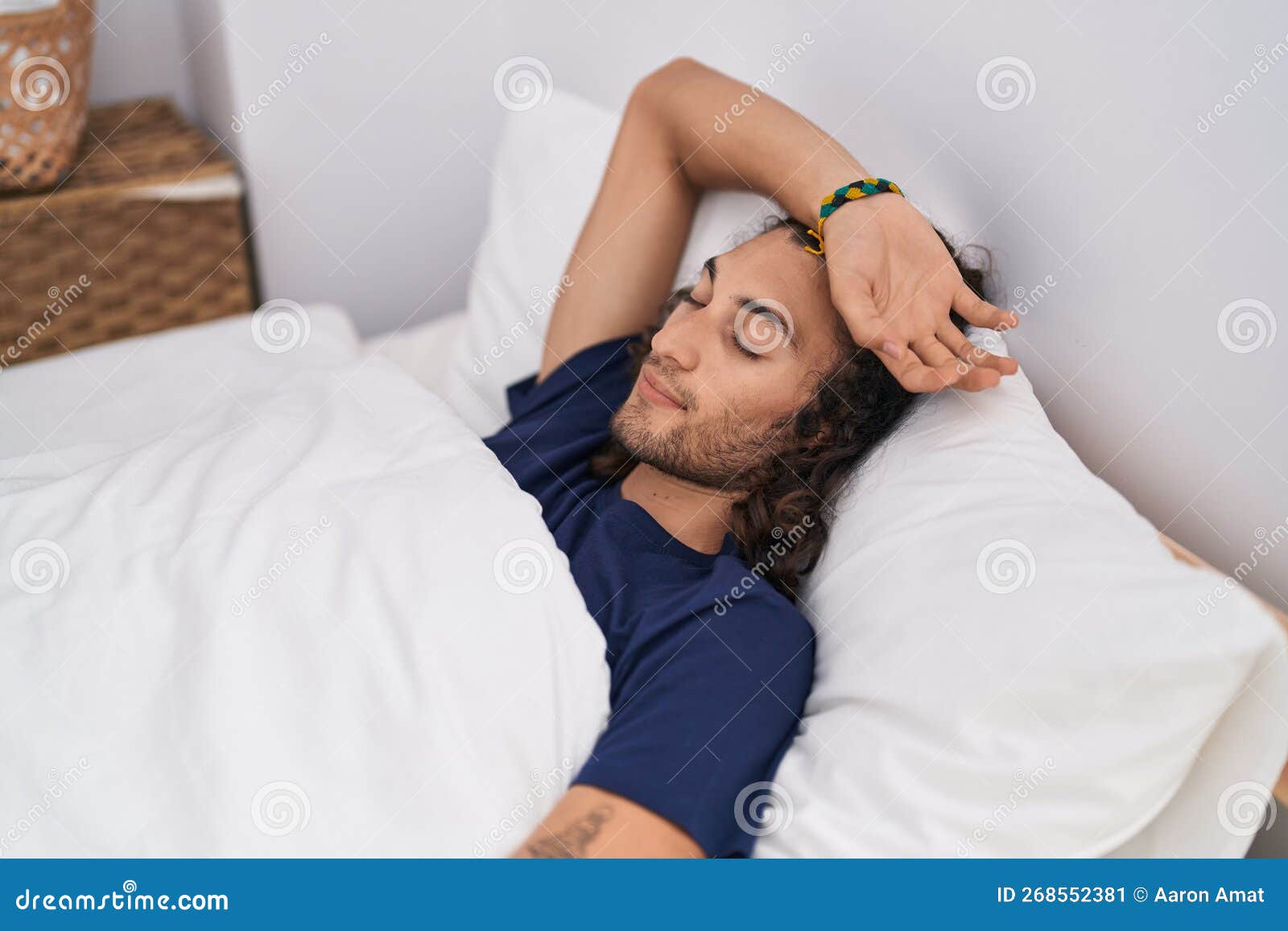 Young Hispanic Man Lying on Bed Sleeping at Bedroom Stock Image - Image ...