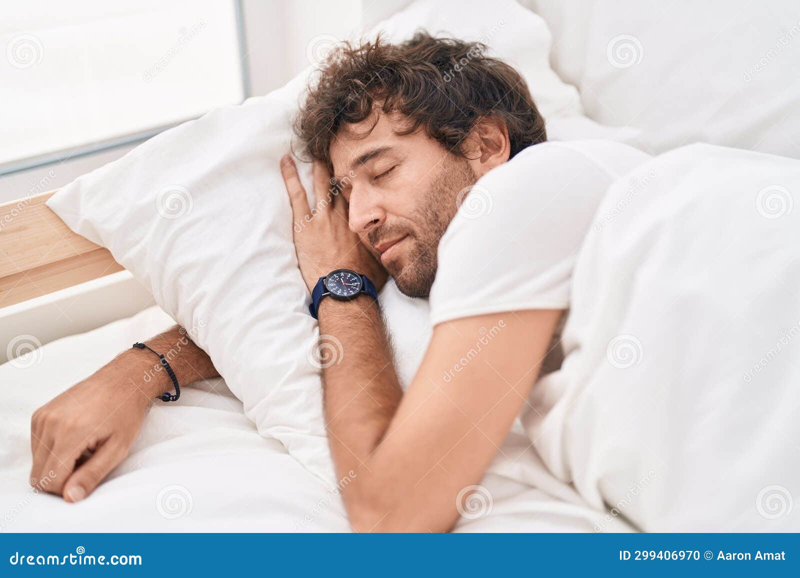 Young Hispanic Man Lying on Bed Sleeping at Bedroom Stock Photo - Image ...
