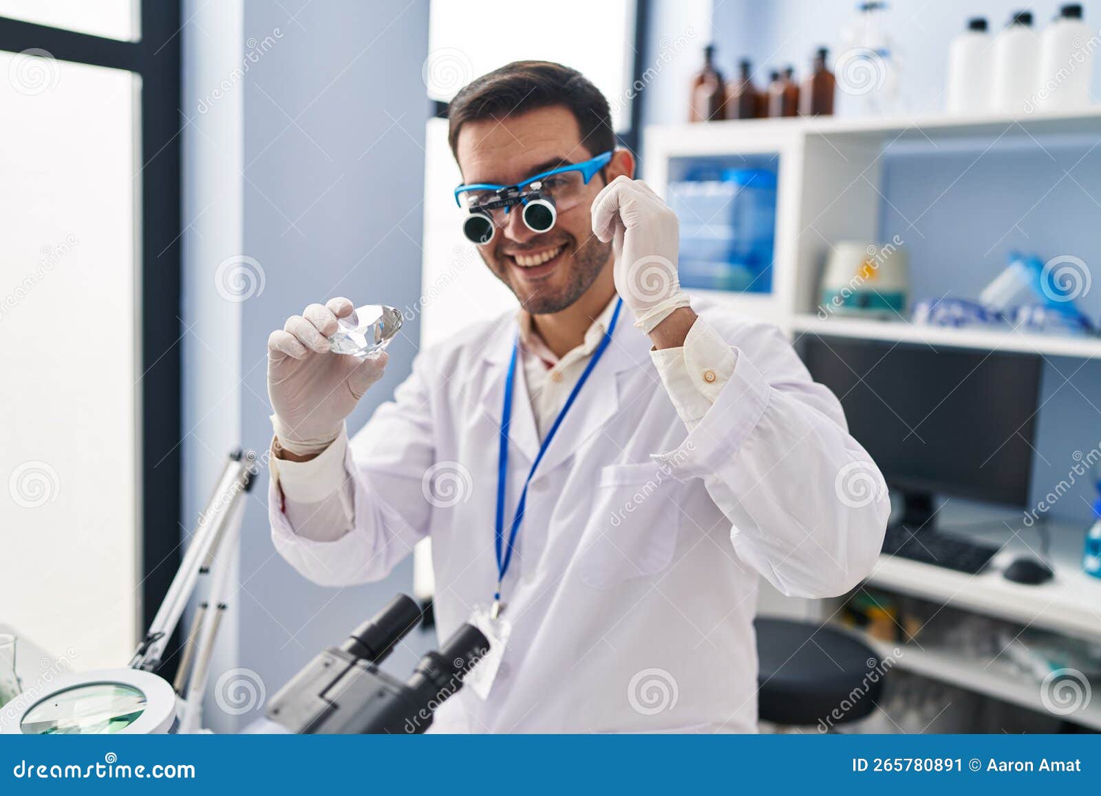 Young Hispanic Man Scientist Looking Diamond by Magnifying Glasses at ...