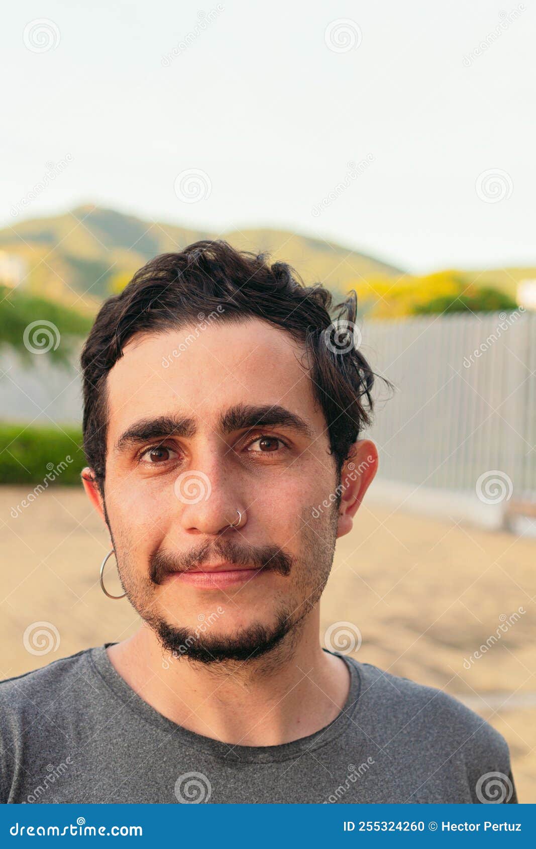 Young Hispanic Man in Serious City Facial Portrait Stock Photo - Image ... Young Hispanic Man in Serious City Facial Portrait Stock Photo - Image ...