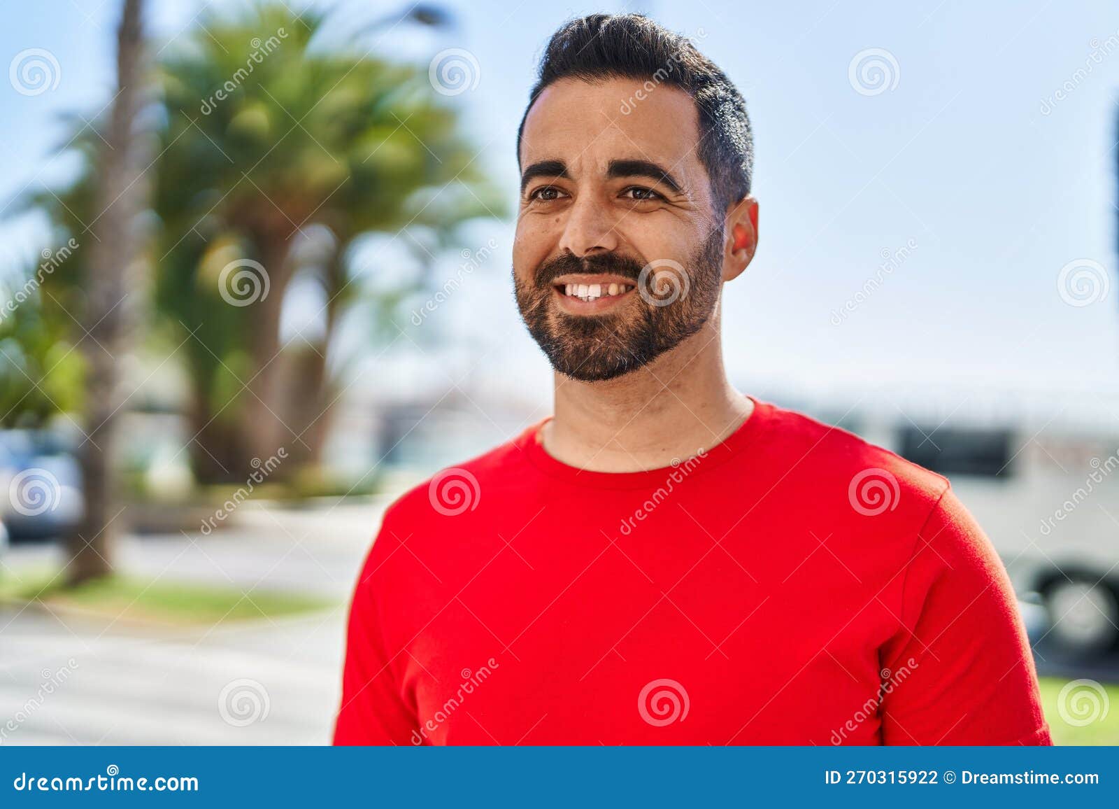 Young Hispanic Man Smiling Confident Standing at Street Stock Photo ...