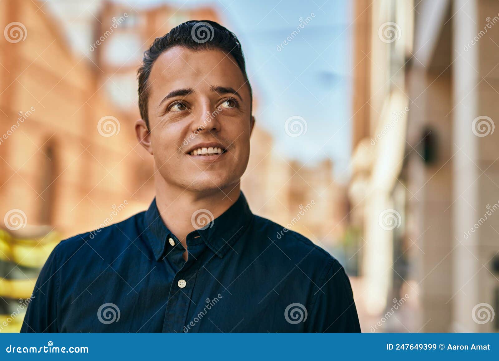 Young Hispanic Man Smiling Happy Standing at the City Stock Image ...