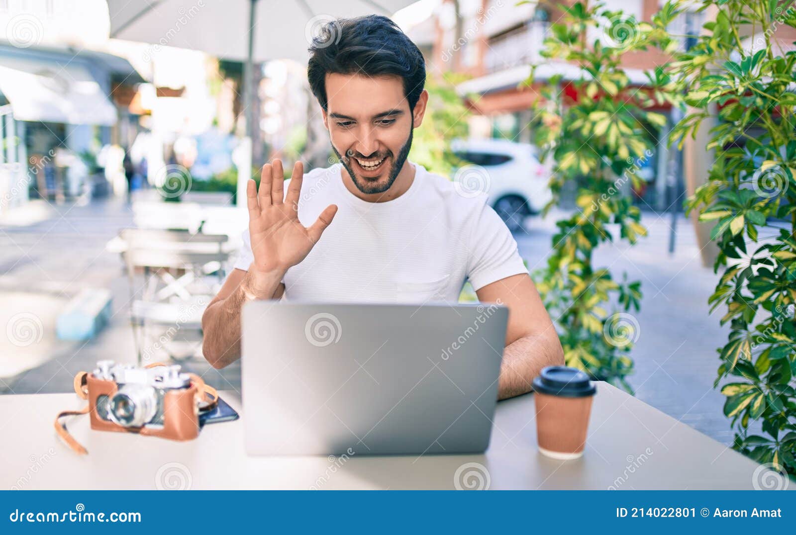 Young Hispanic Man Smiling Happy Working Using Laptop at Coffee Shop ...