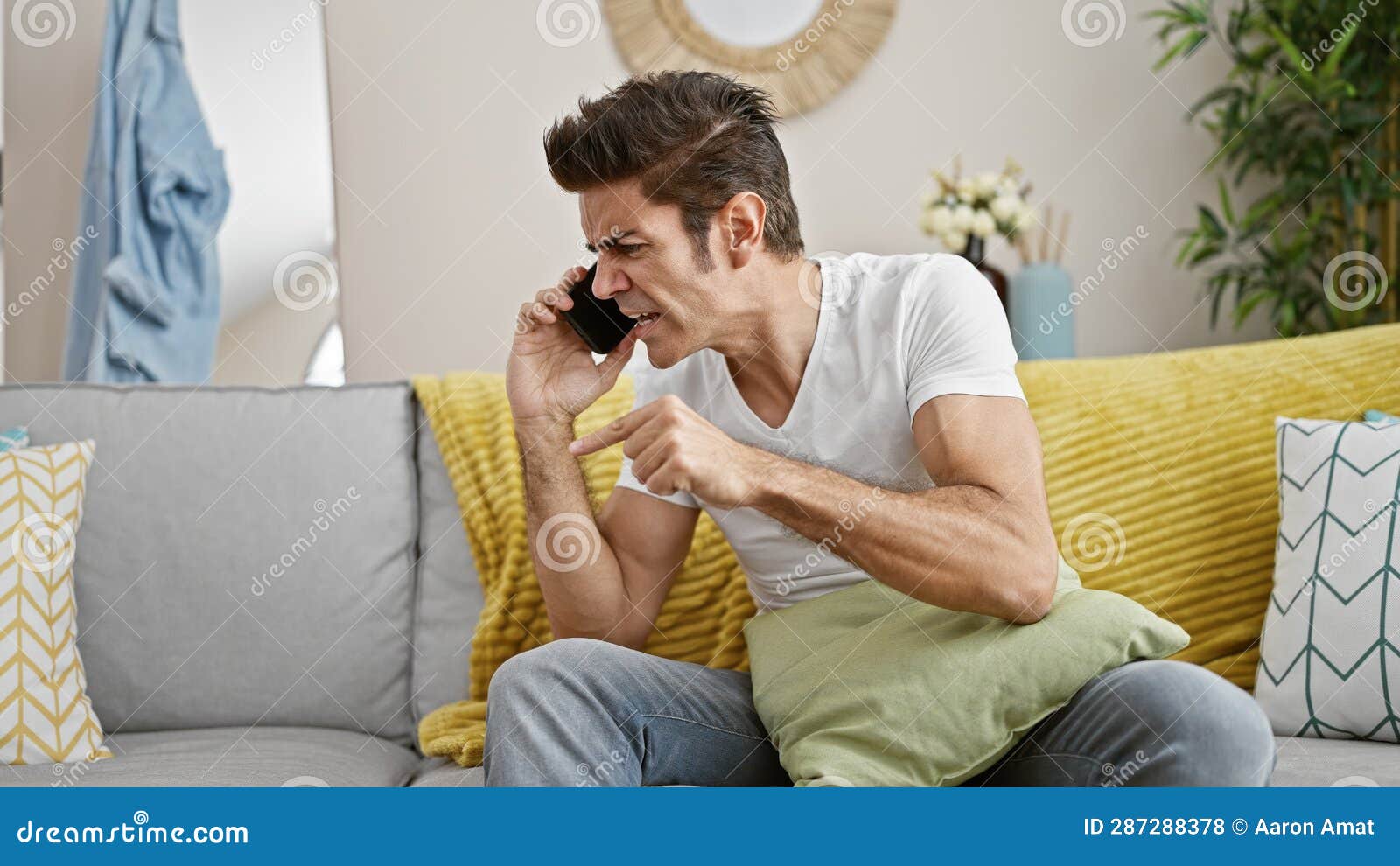 Young Hispanic Man Speaking on the Phone Angry Arguing at Home Stock ...