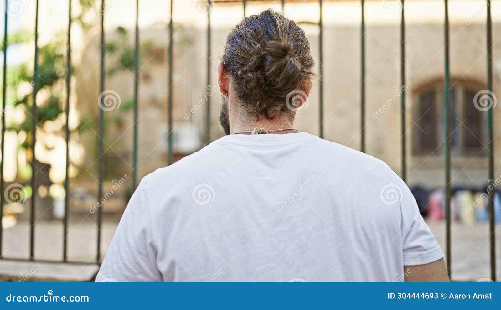 Young Hispanic Man Standing Backwards at Street Stock Image - Image of ...
