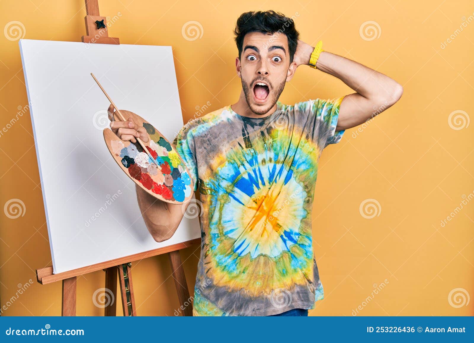 Young Hispanic Man Standing Drawing with Palette by Painter Easel Stand ...