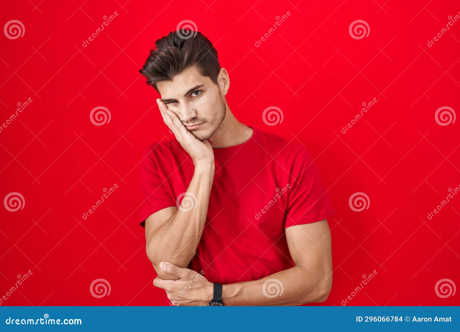 Young Hispanic Man Standing Over Red Background Thinking Looking Tired ...
