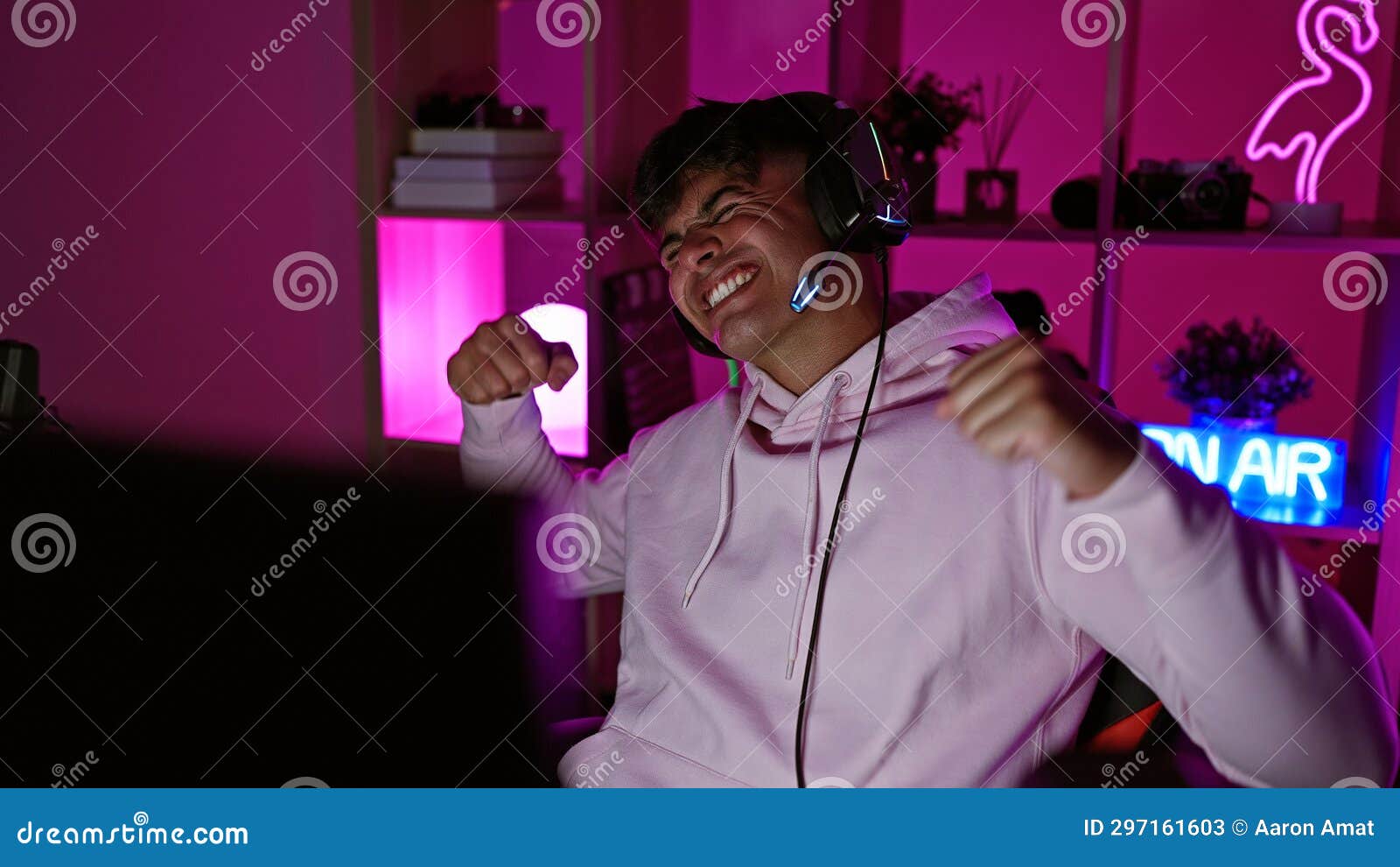 Young Hispanic Man Streamer Playing Video Game Dancing at Gaming Room ...