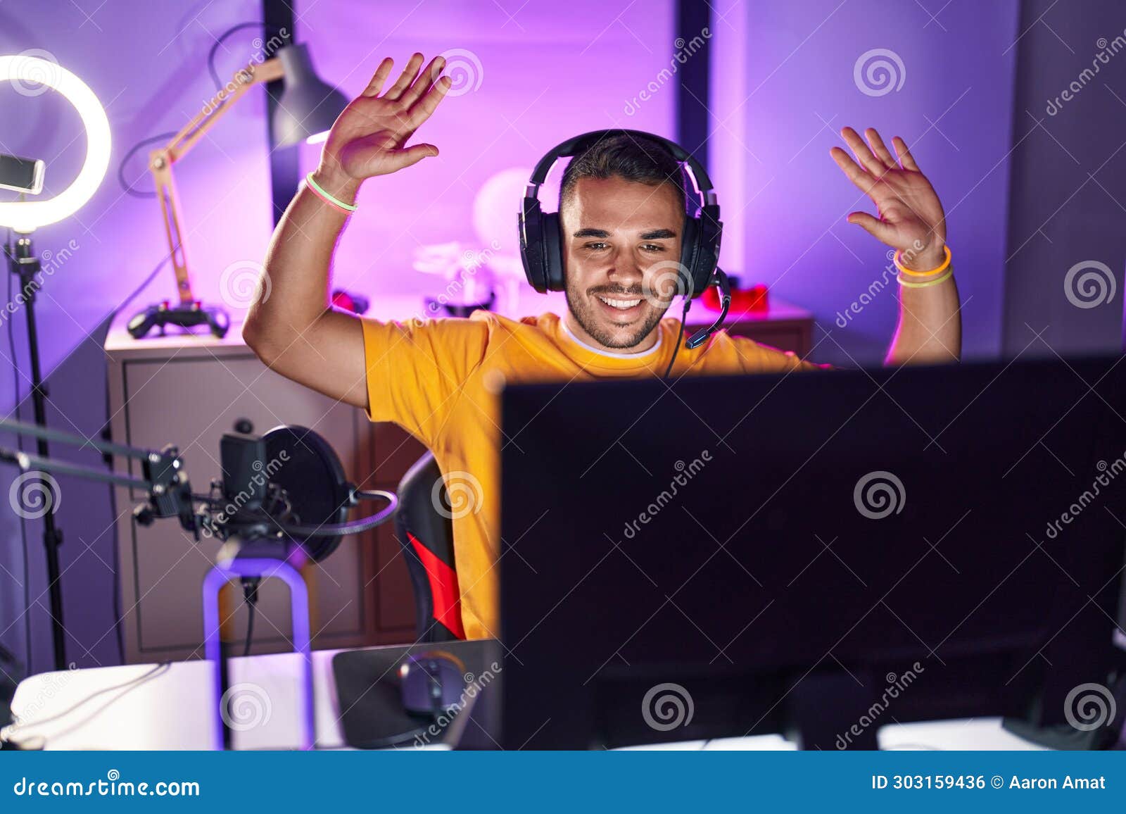 Young Hispanic Man Streamer Playing Video Game Dancing at Gaming Room ...