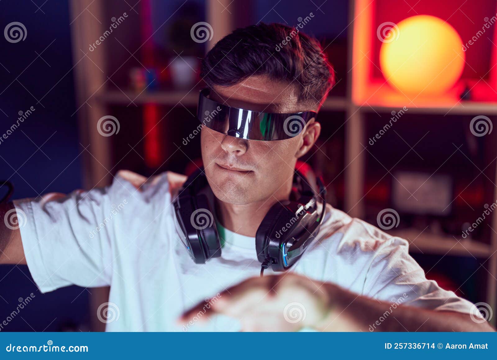 Young Hispanic Man Streamer Playing Video Game Using Virtual Reality ...