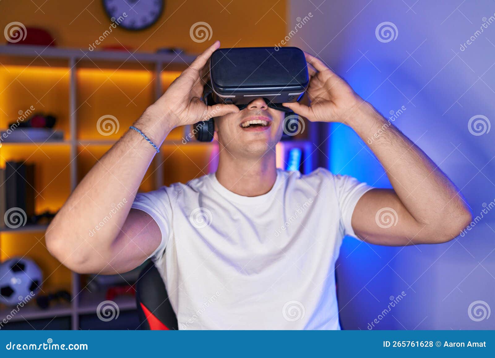 Young Hispanic Man Streamer Playing Video Game Using Virtual Reality ...