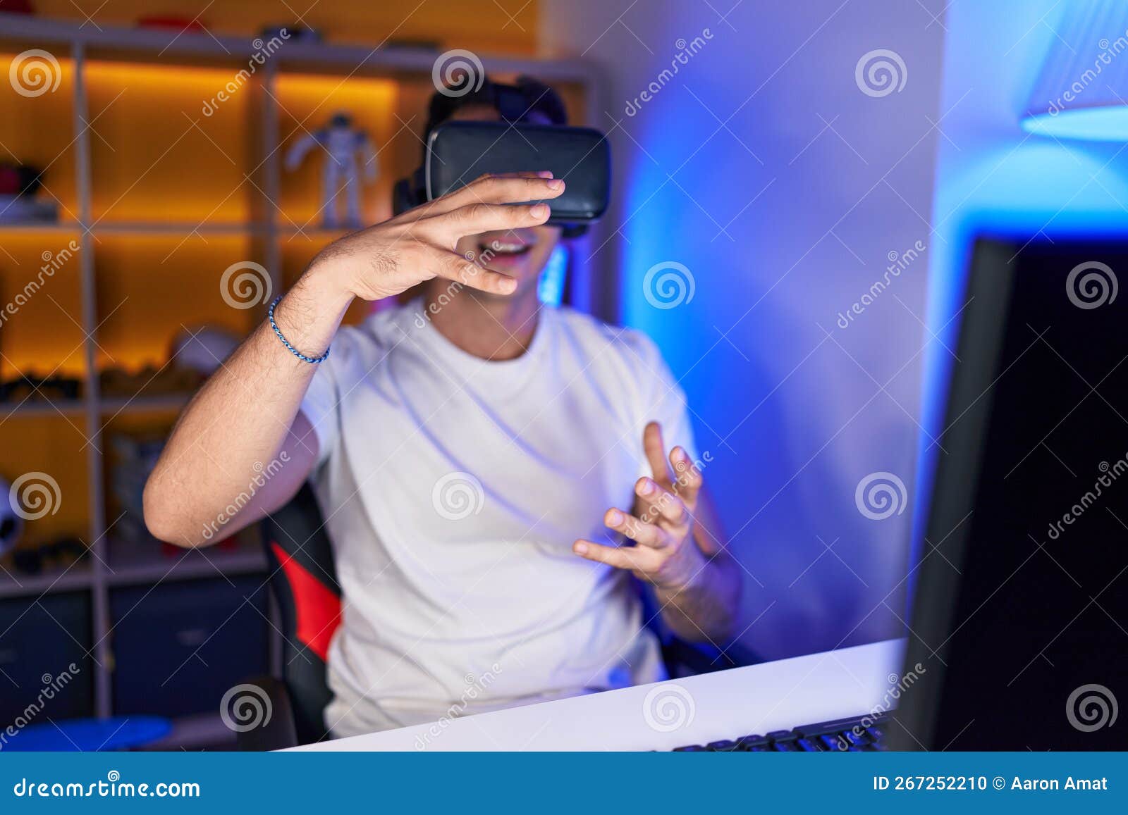 Young Hispanic Man Streamer Playing Video Game Using Virtual Reality ...