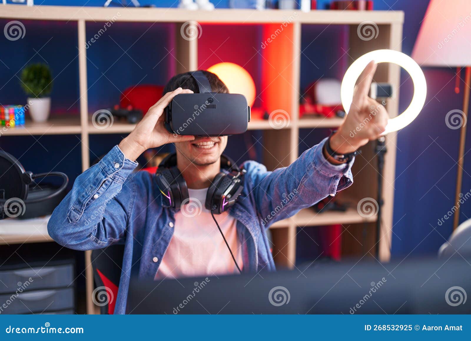 Young Hispanic Man Streamer Playing Video Game Using Virtual Reality ...