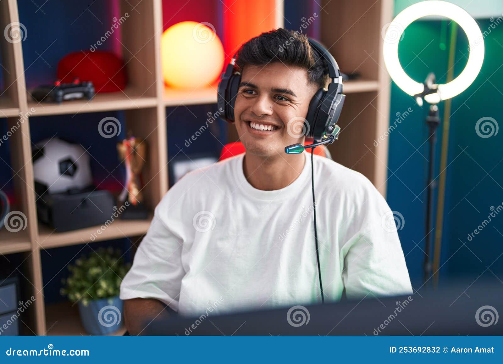Young Hispanic Man Streamer Smiling Confident Sitting on Table at ...