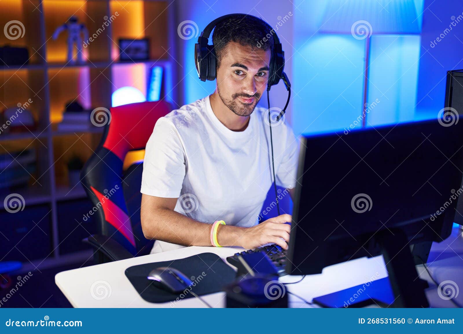 Young Hispanic Man Streamer Smiling Confident Sitting on Table at ...