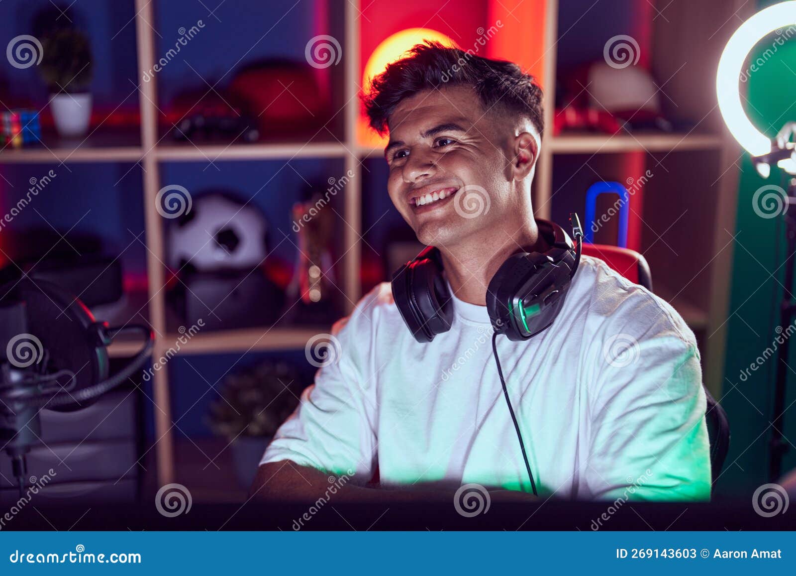 Young Hispanic Man Streamer Smiling Confident Sitting on Table at ...