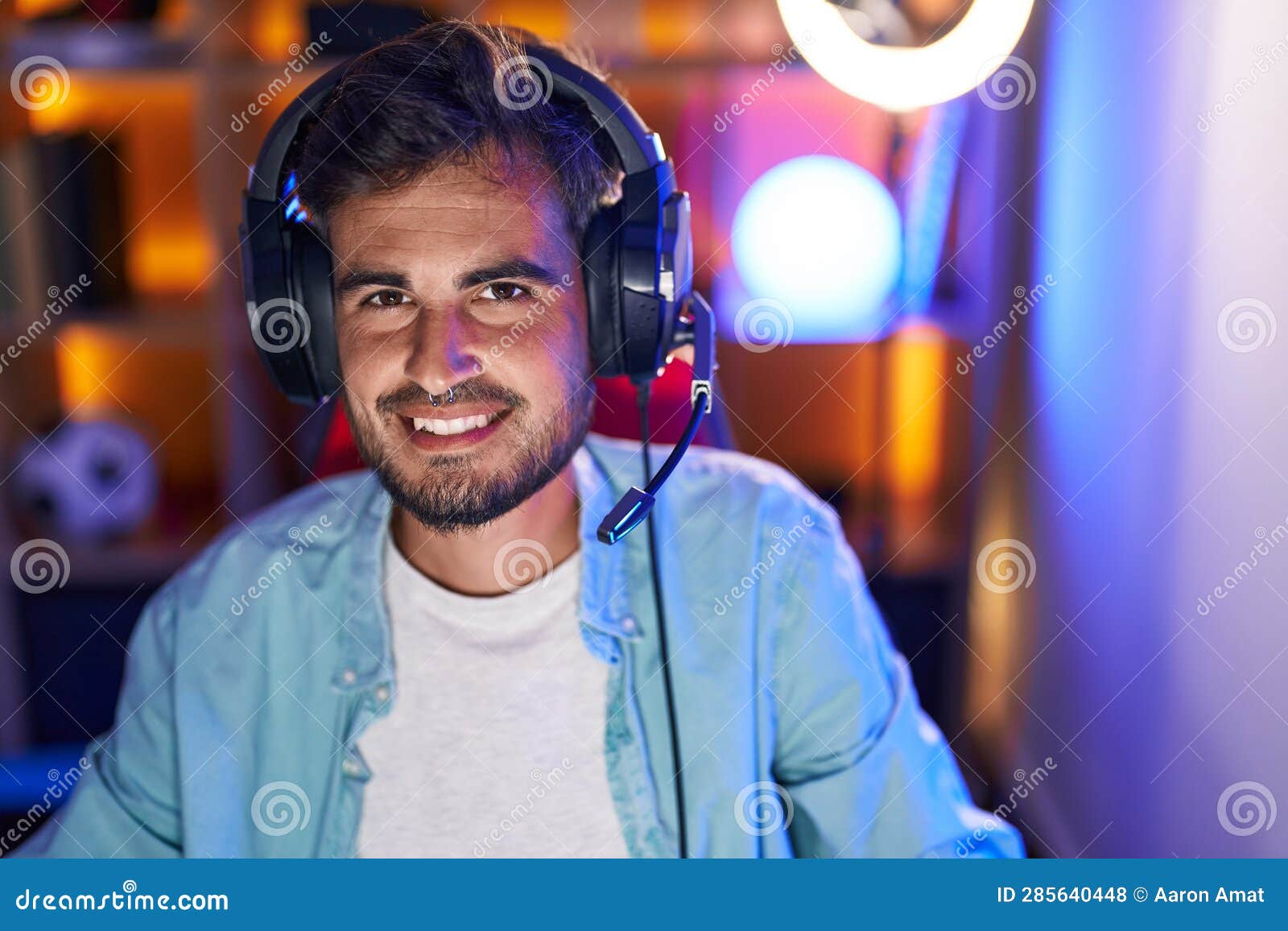 Young Hispanic Man Streamer Smiling Confident Sitting on Table at ...
