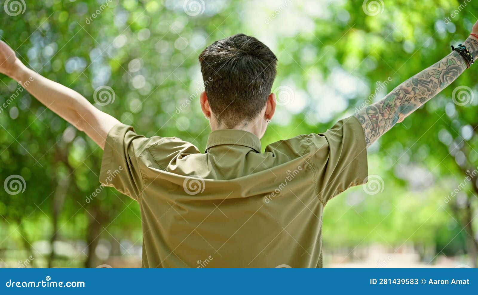 Young Hispanic Man Stretching Arms Backwards at Park Stock Video ...