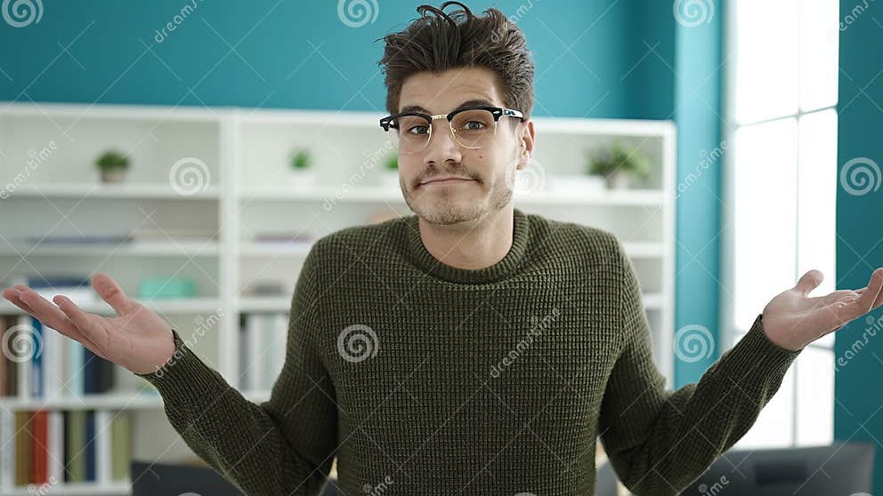 Young Hispanic Man Student Standing with I Dont Know Expression at ...