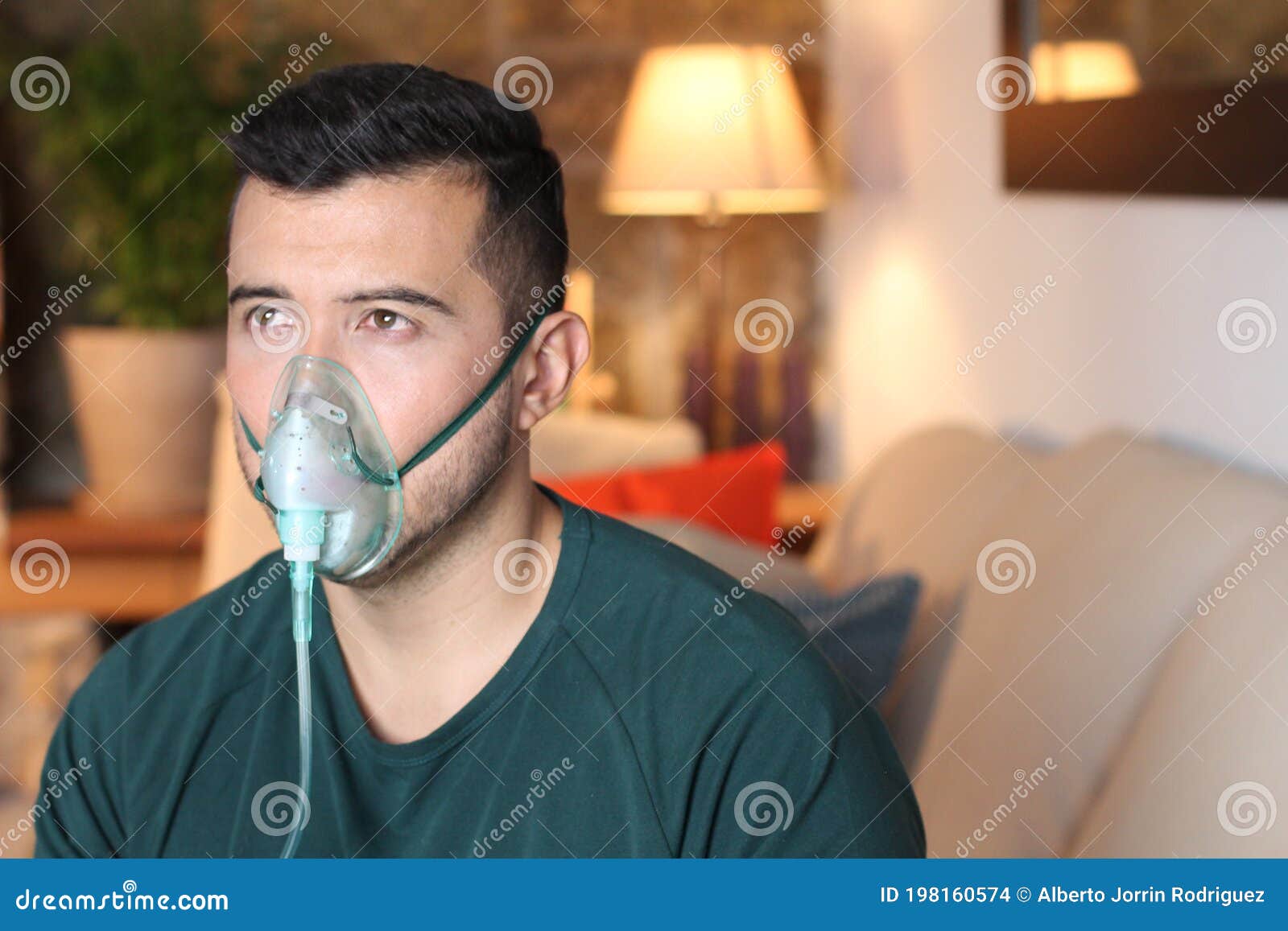 Young Hispanic Man Using Oxygen Mask Stock Photo - Image of care, home ...